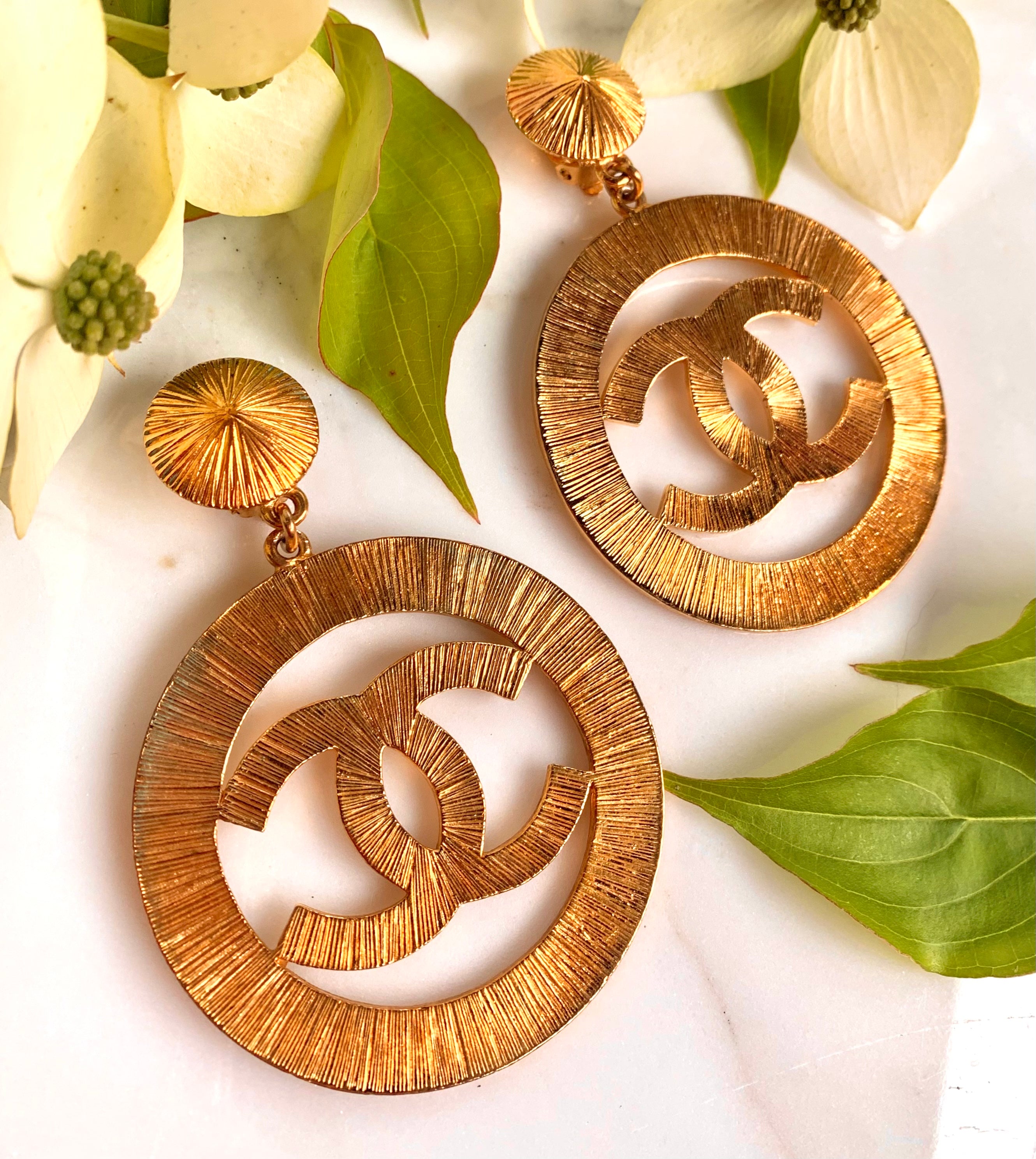 CHANEL MASSIVE ICONIC SUN BURST LOGO CELEBRITY HOOP EARRINGS 1992 – The ...